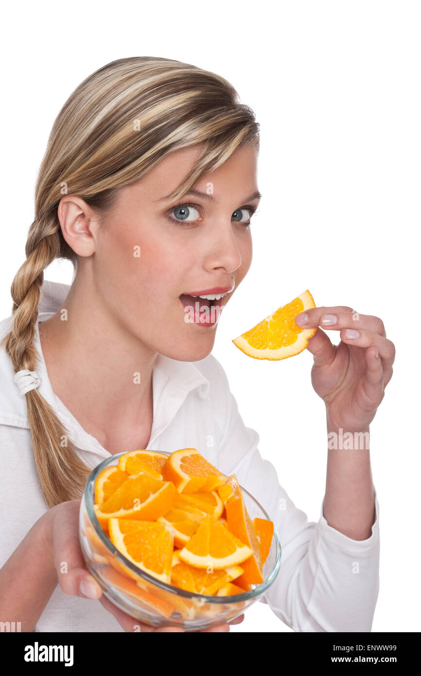 Healthy lifestyle series - Woman eating orange Stock Photo - Alamy
