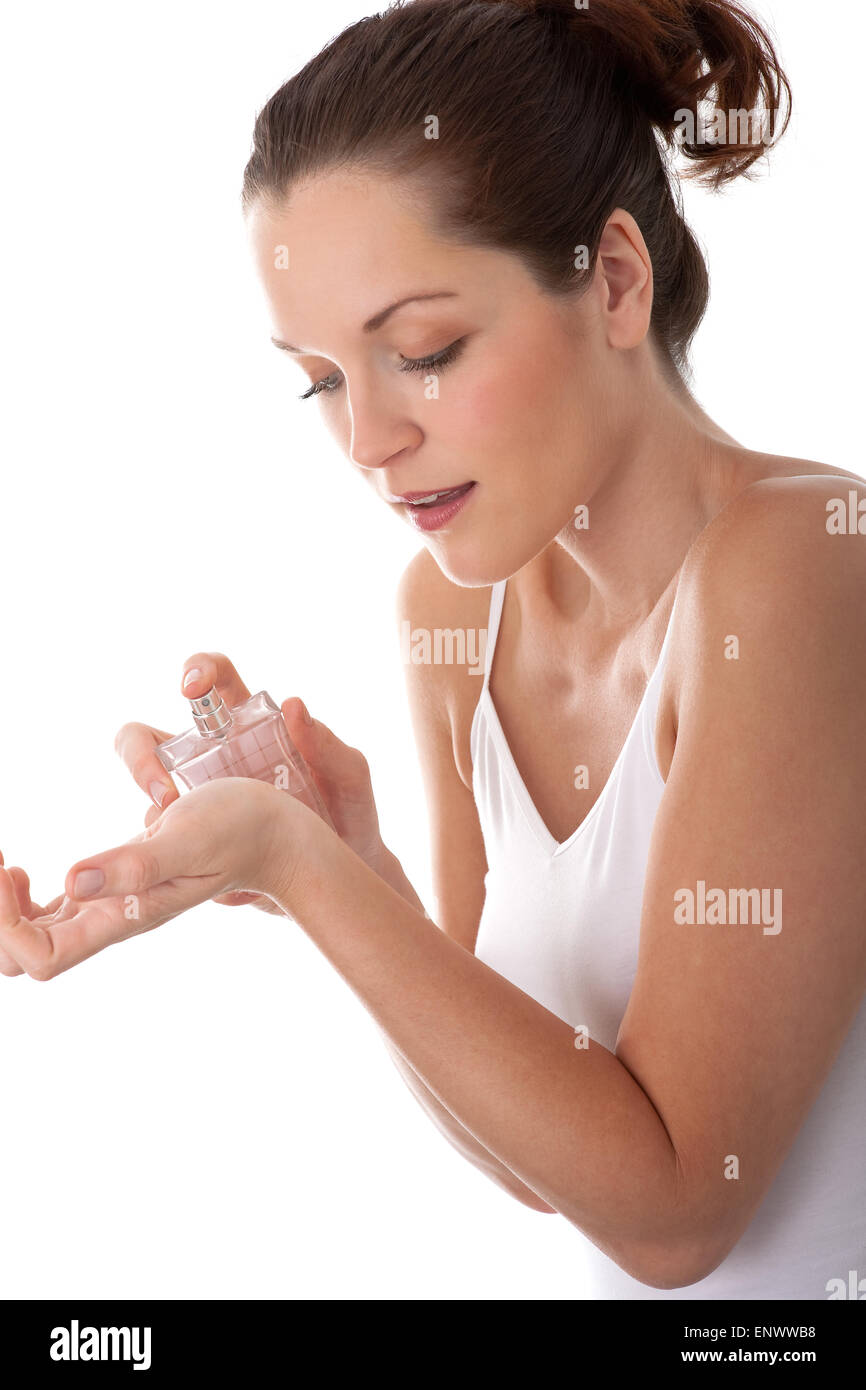 Woman spraying perfume and wrist hi-res stock photography and images ...