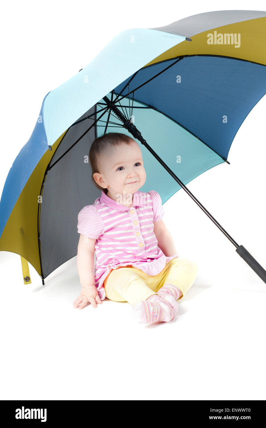 Cute baby girl under umbrella Stock Photo - Alamy