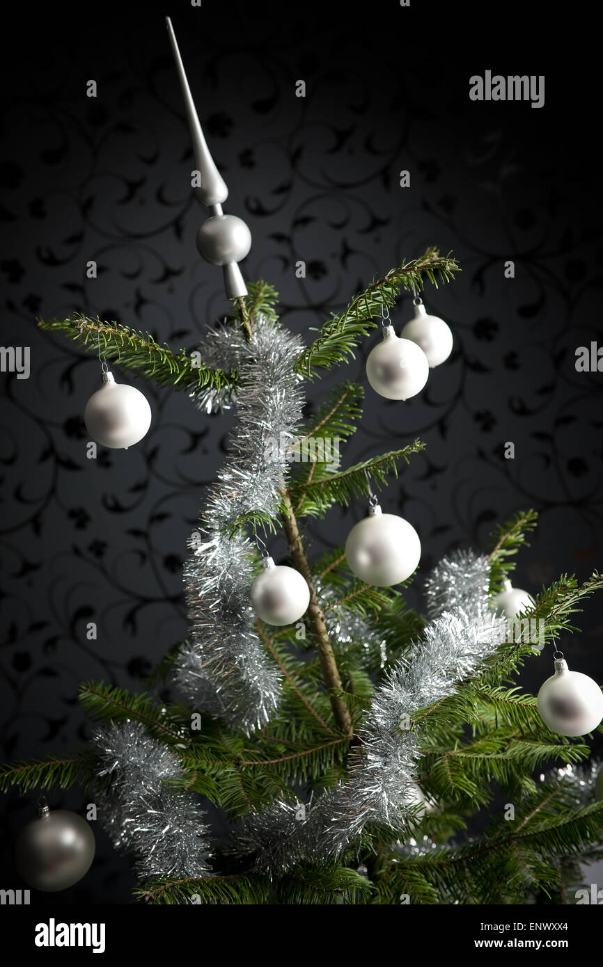 Silver decorated Christmas tree with balls and chains Stock Photo - Alamy
