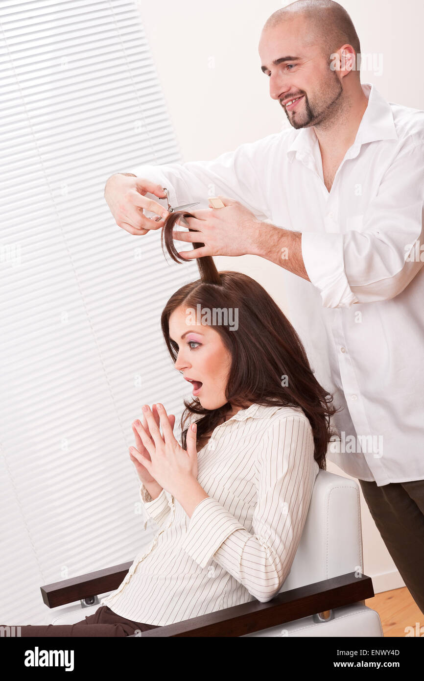Professional hairdresser cut with scissors at salon Stock Photo - Alamy