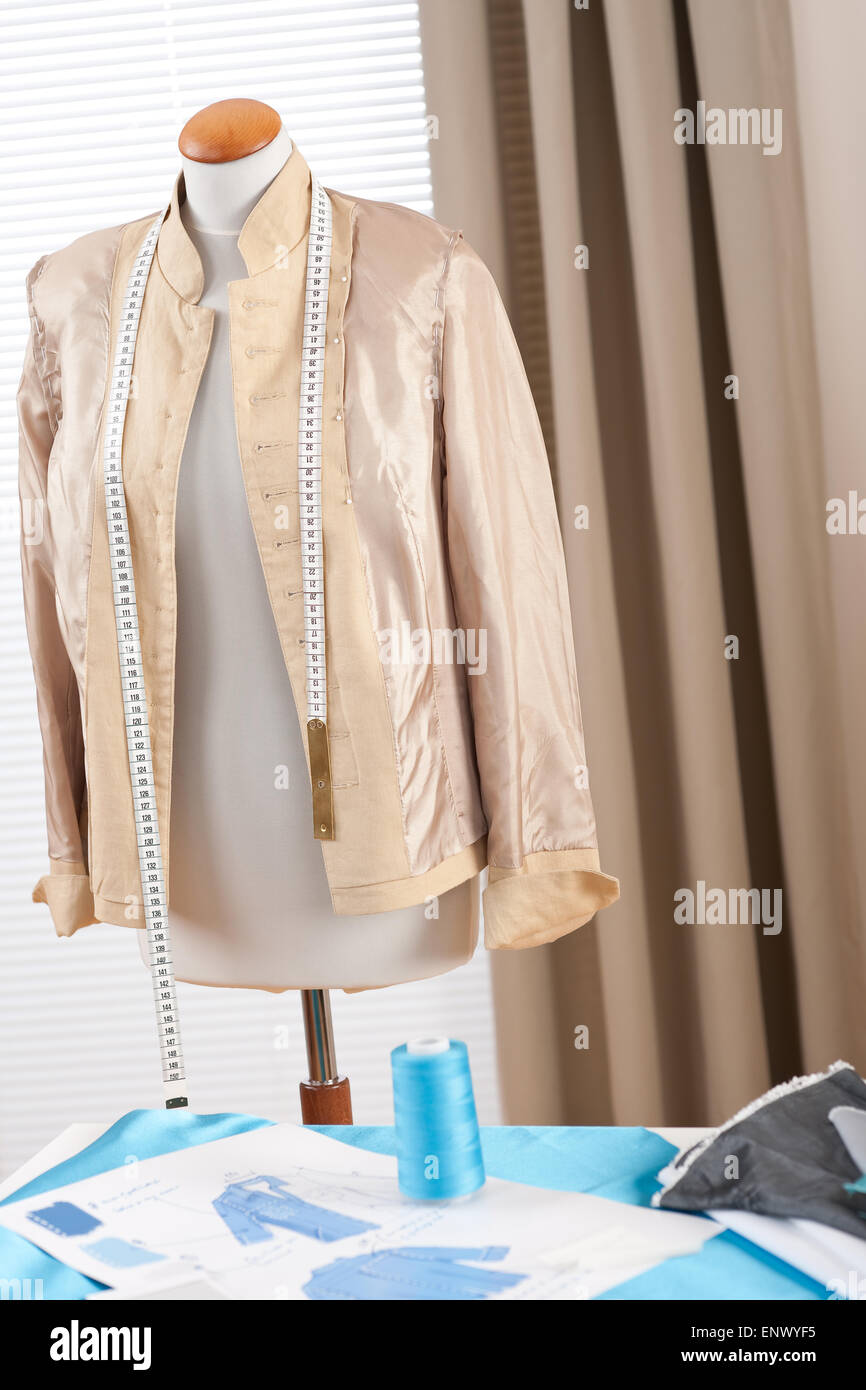 Fashion designer studio with professional equipment Stock Photo - Alamy