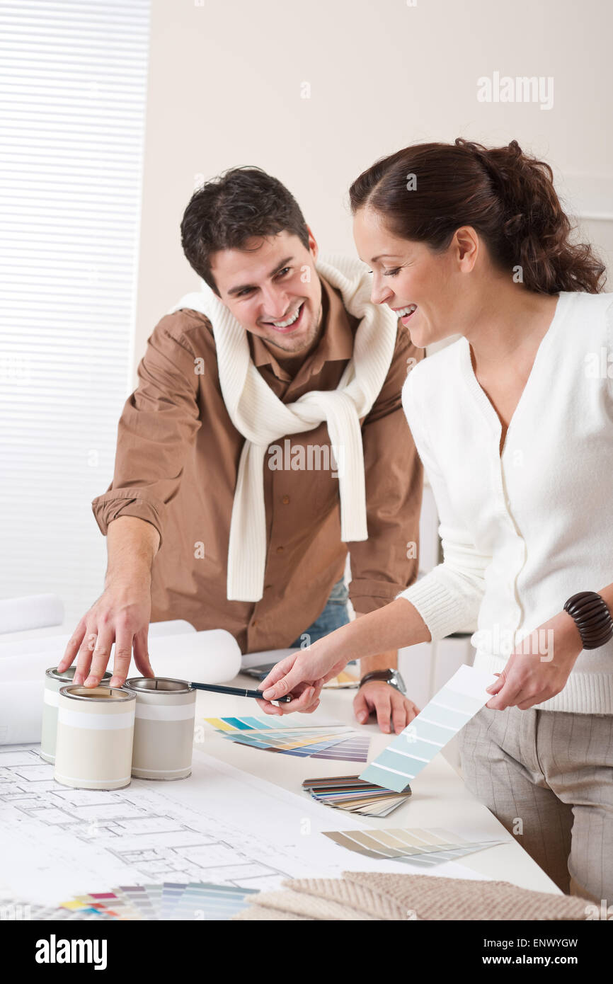 Two interior designer working at office with color swatch Stock Photo ...
