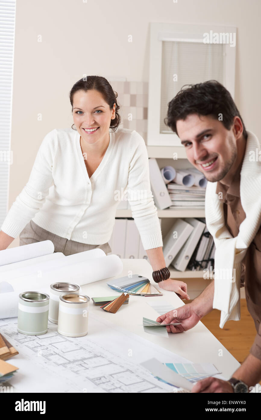 Two interior designer working at office with color swatch Stock Photo ...