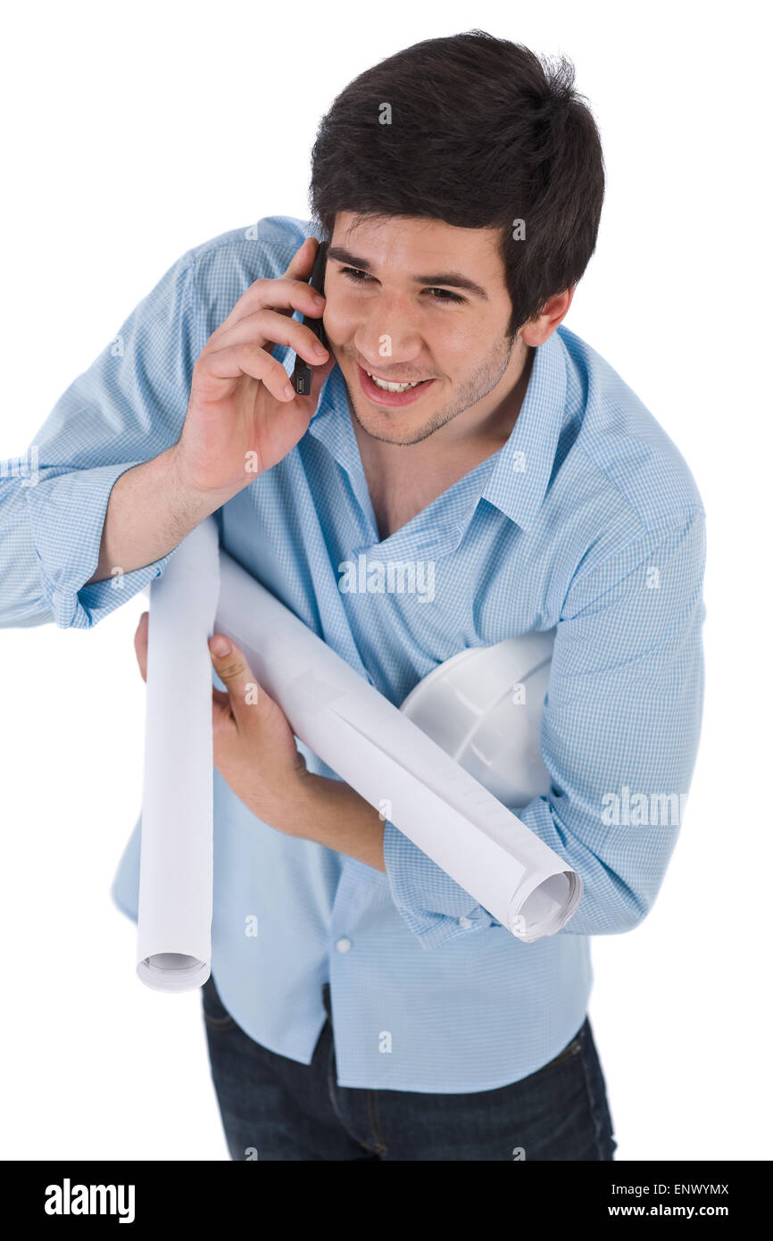 Male architect student with helmet and plans calling Stock Photo - Alamy