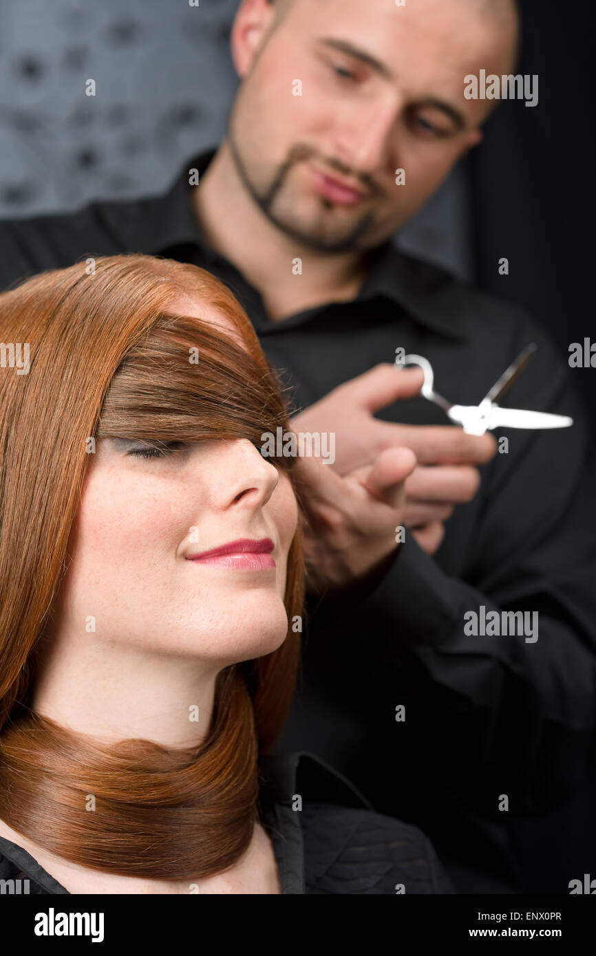 Professional hairdresser with fashion model at luxury salon Stock Photo ...