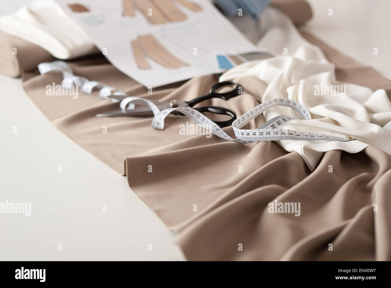 Fashion designer studio with professional equipment Stock Photo - Alamy