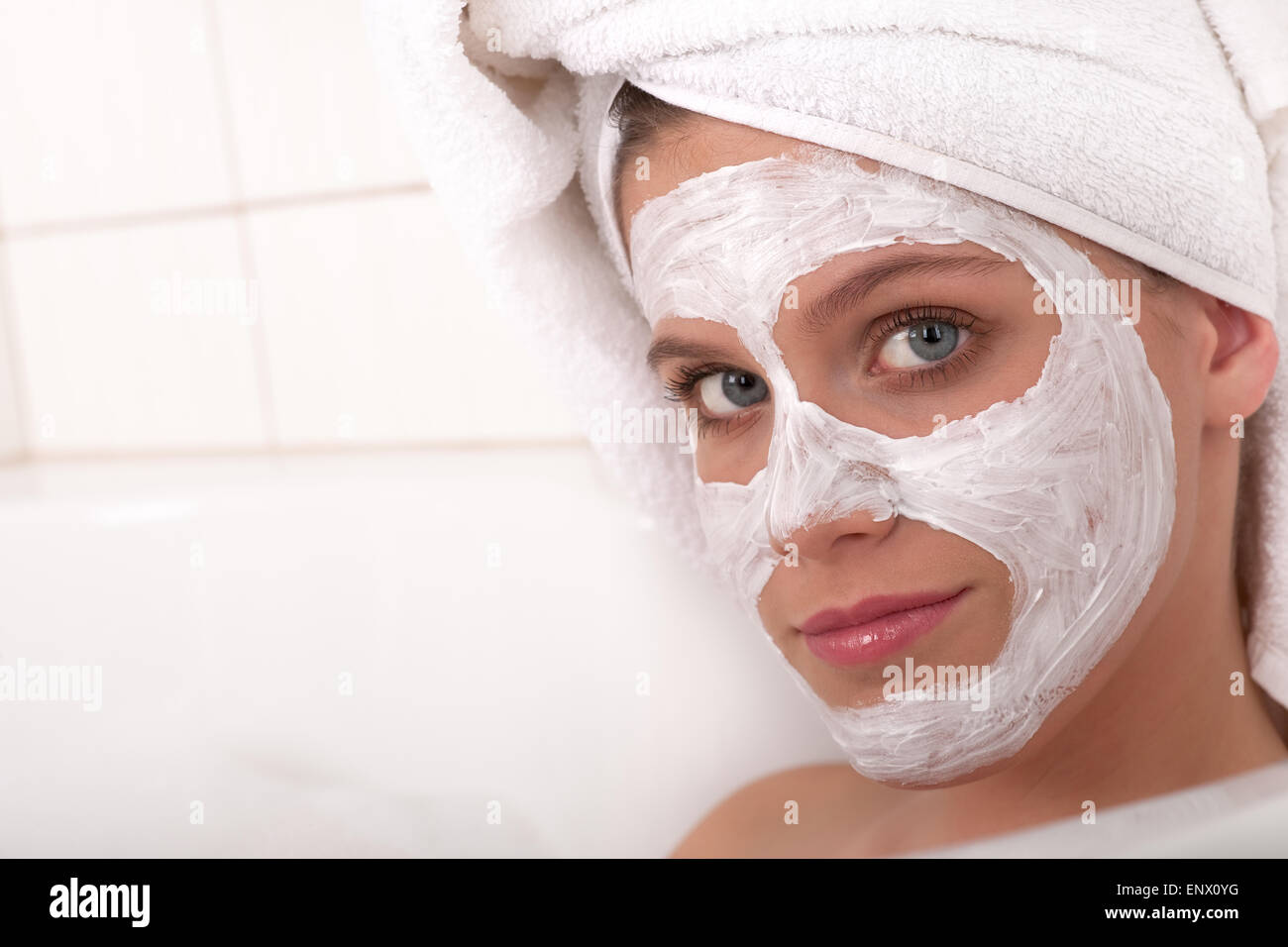Body care series - Young woman with facial mask Stock Photo - Alamy