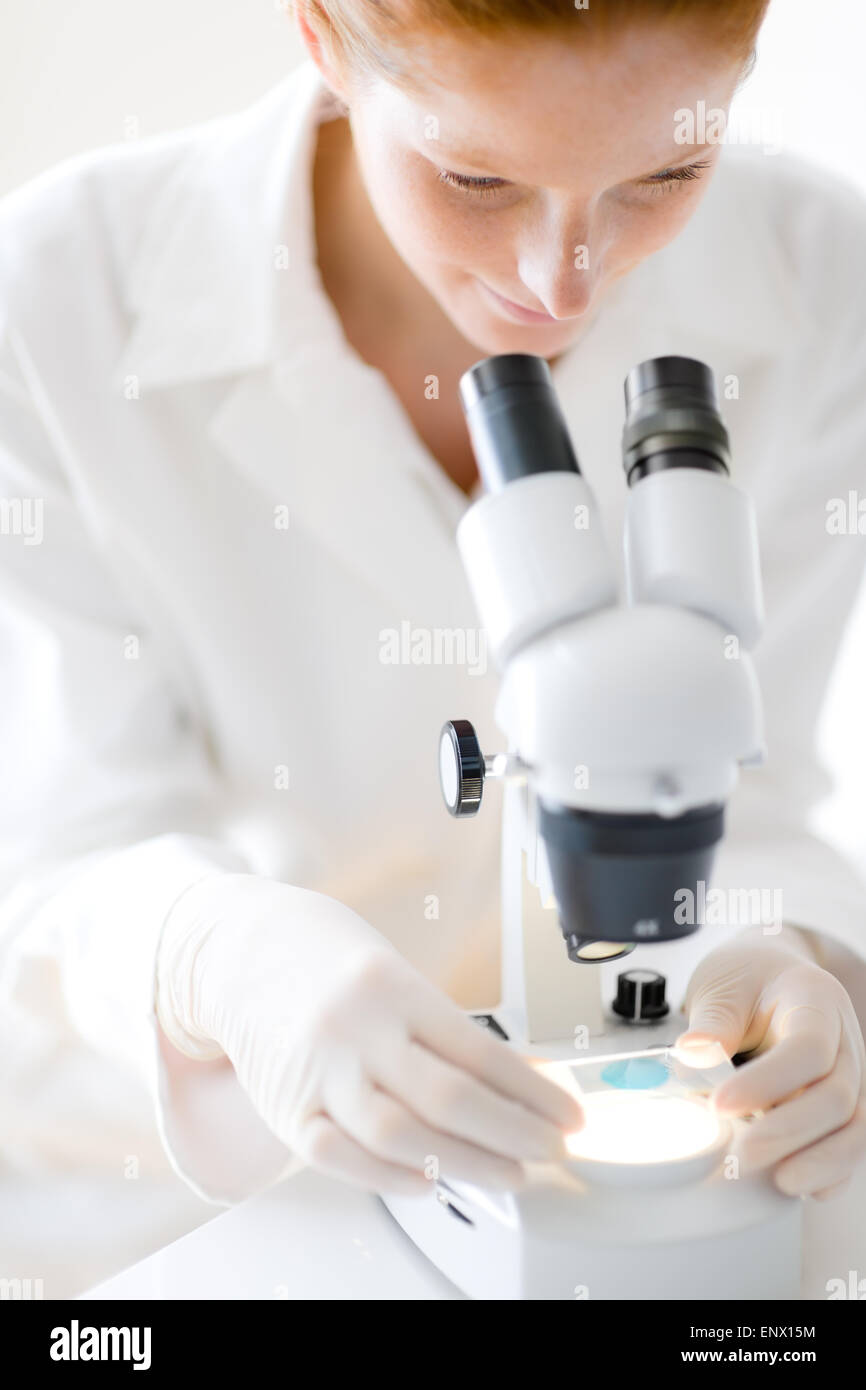 Microscope laboratory - woman medical research Stock Photo - Alamy