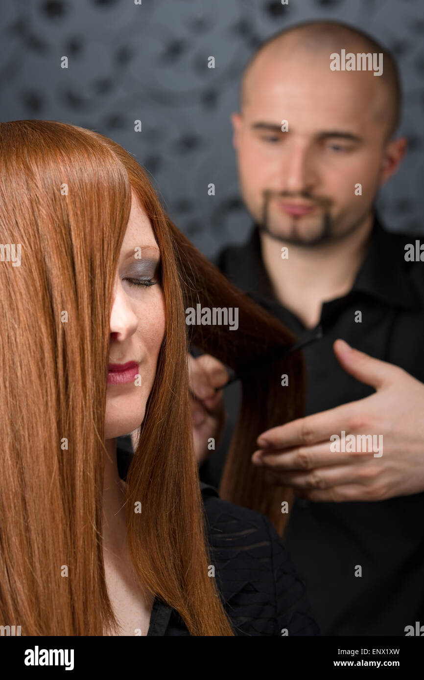 Professional hairdresser with fashion model at luxury salon Stock Photo ...