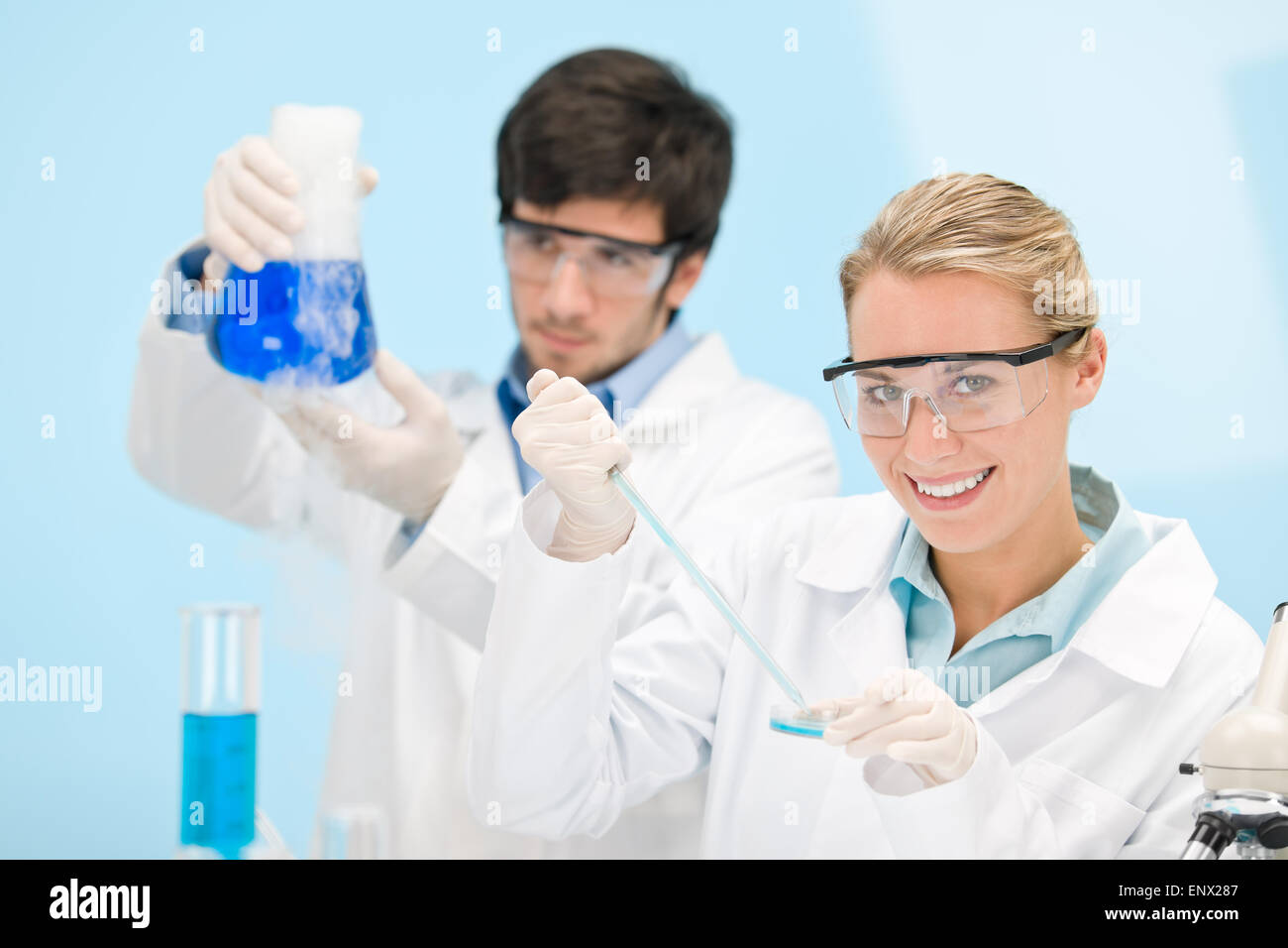 Flu virus experiment - scientist in laboratory Stock Photo - Alamy