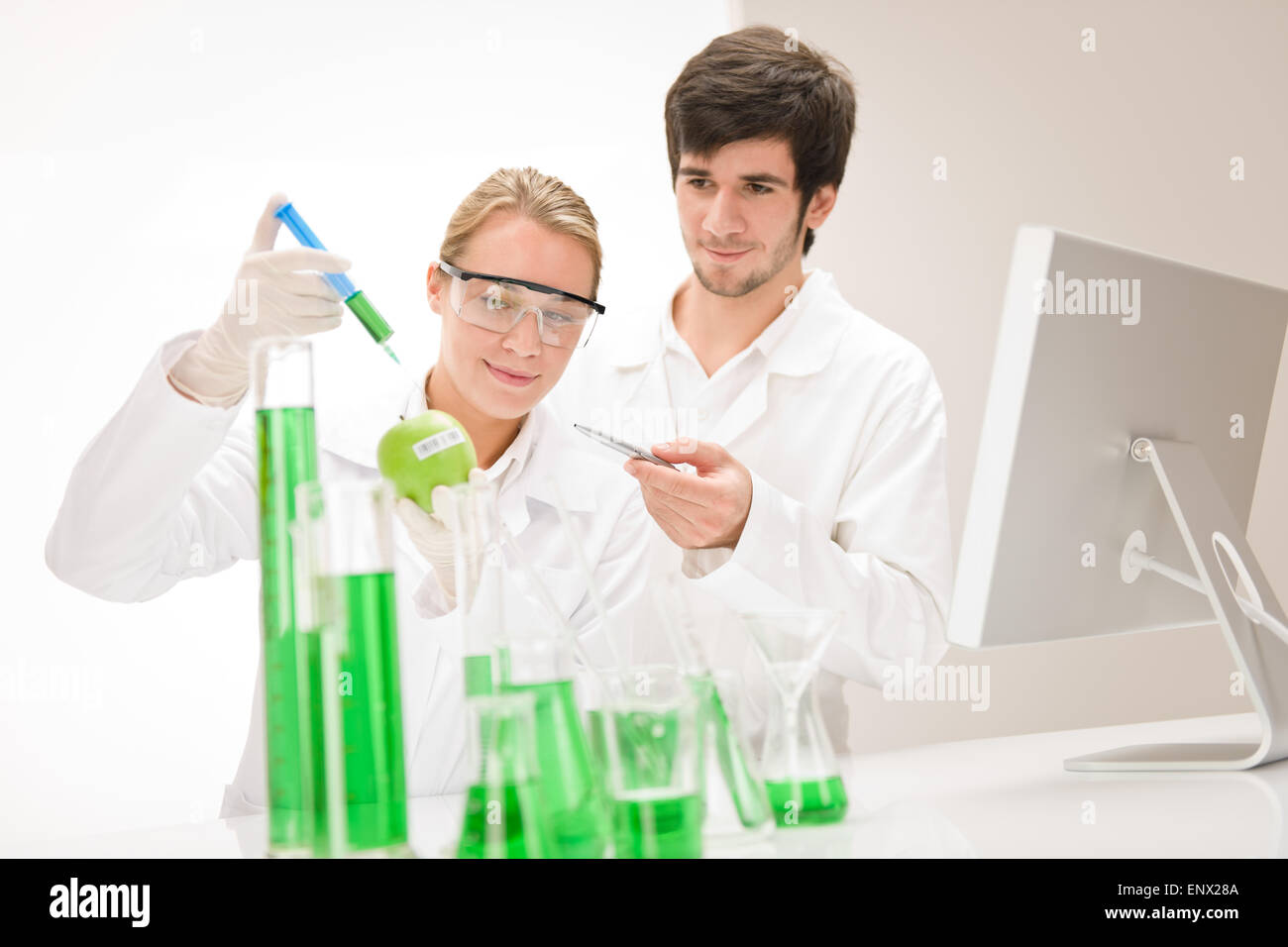 Genetic engineering - scientists in laboratory Stock Photo - Alamy