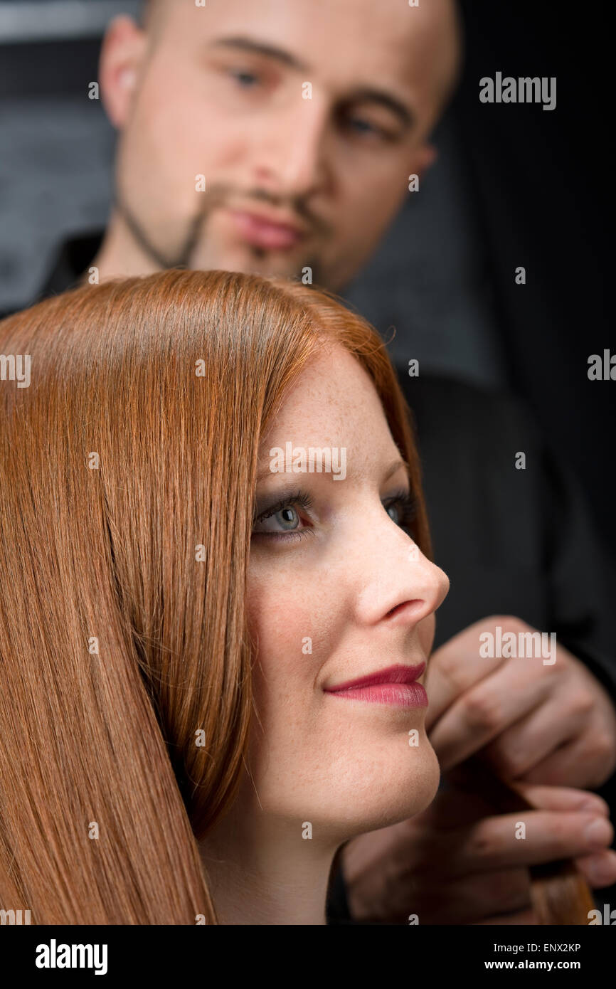 Professional hairdresser with fashion model at luxury salon Stock Photo ...