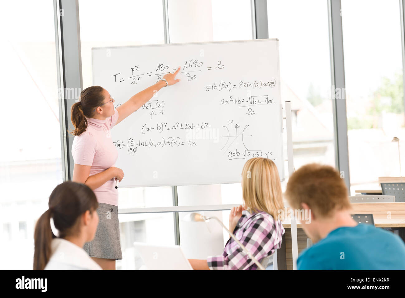High school students with professor in classroom Stock Photo - Alamy