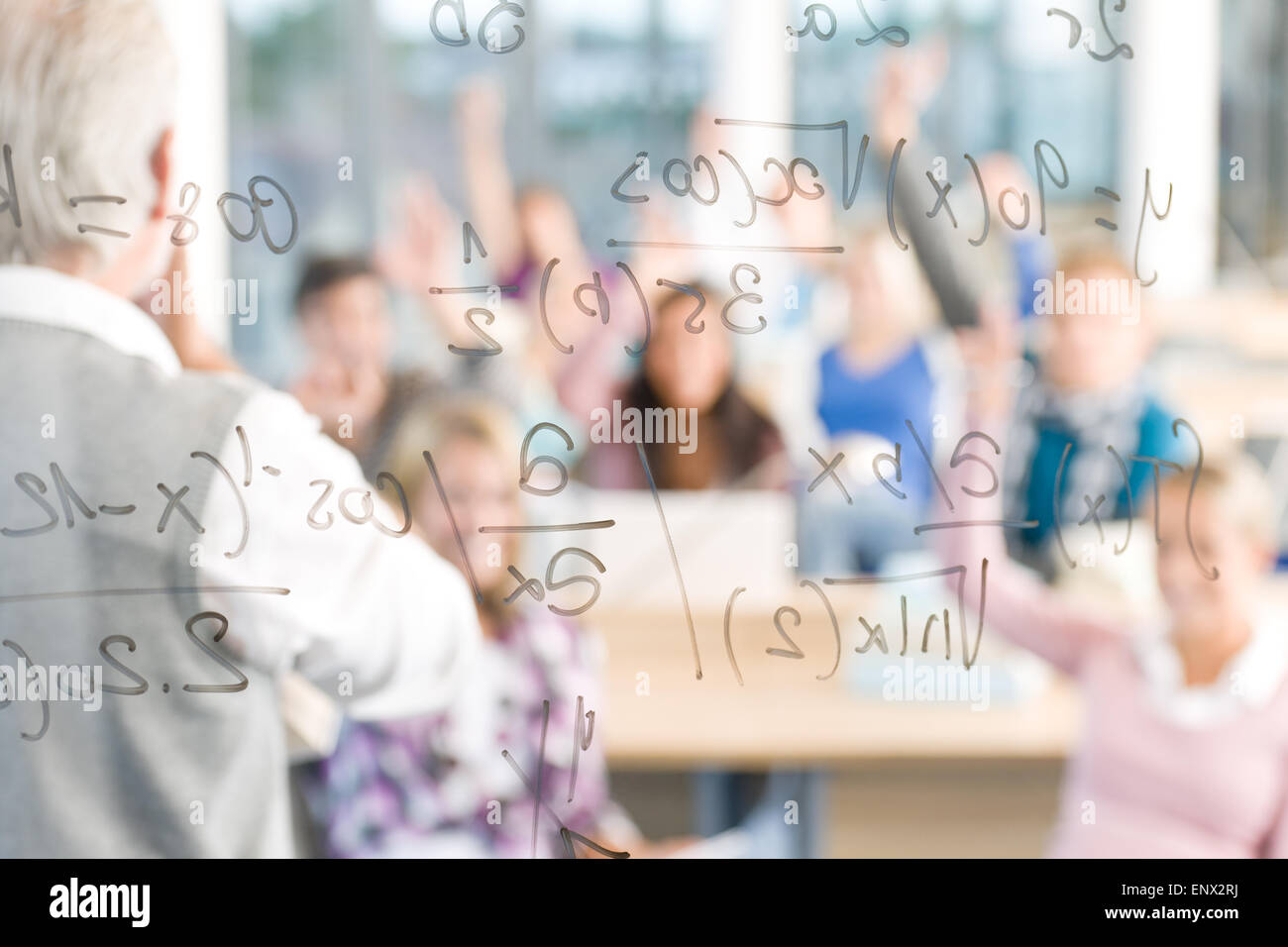 Math lesson at high school - students with professor Stock Photo - Alamy
