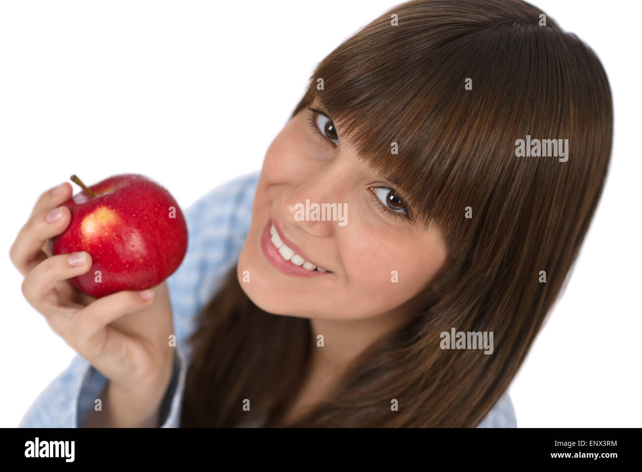Happy teenager eating healthy apple for breakfast Stock Photo - Alamy