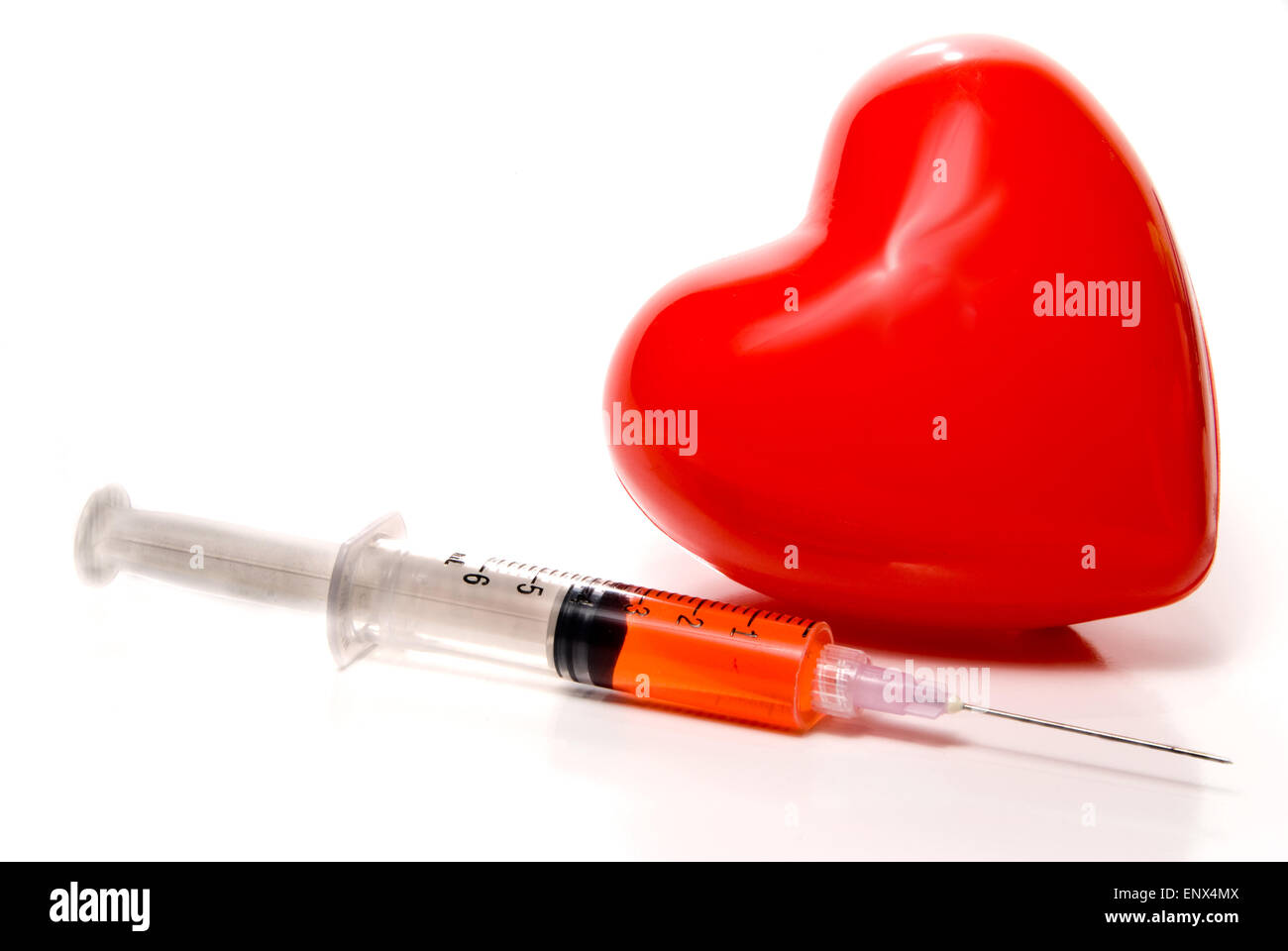 Heart care syringe vaccination hi-res stock photography and images - Alamy