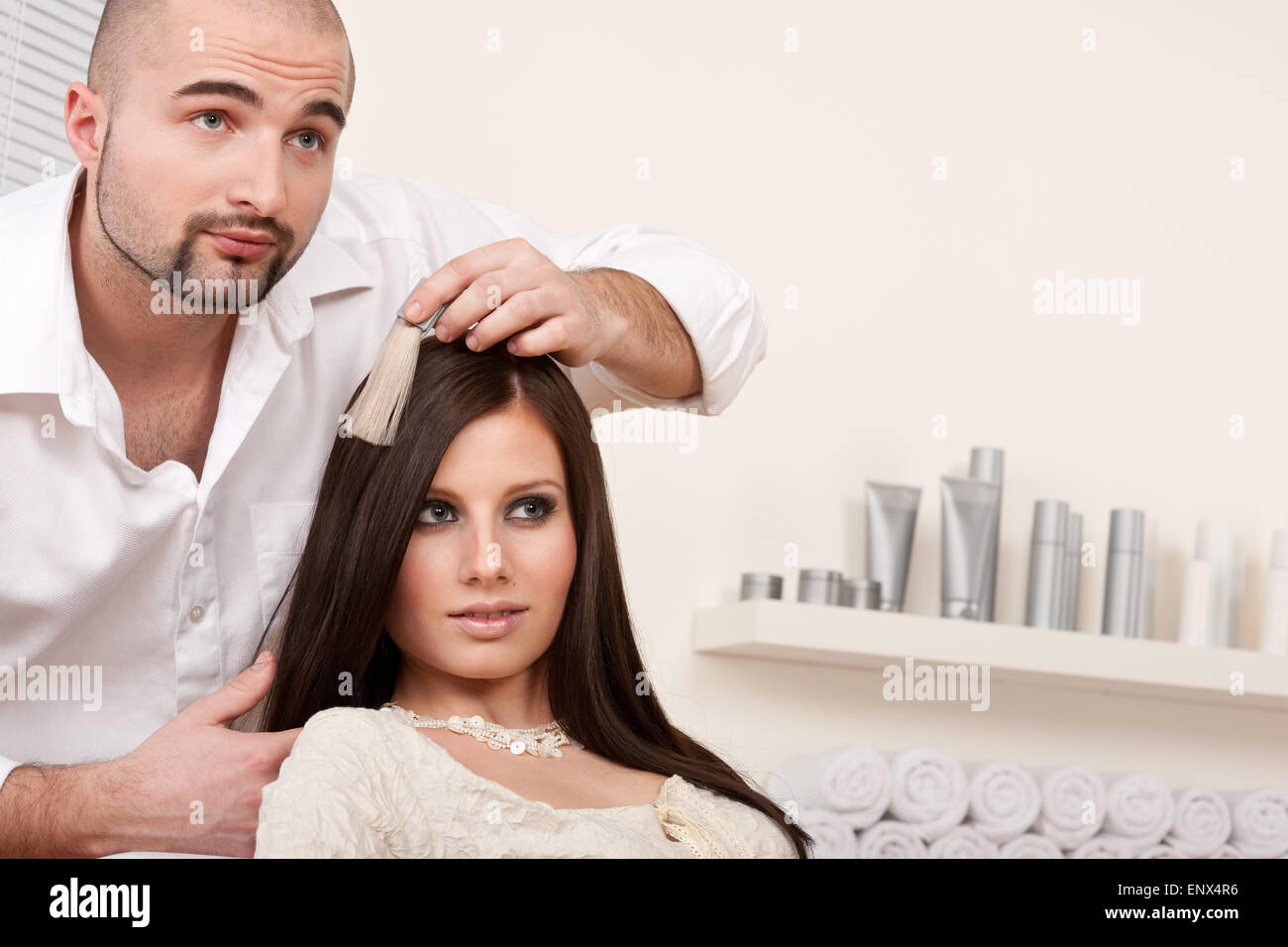 Professional hairdresser choose hair dye color at salon Stock Photo - Alamy