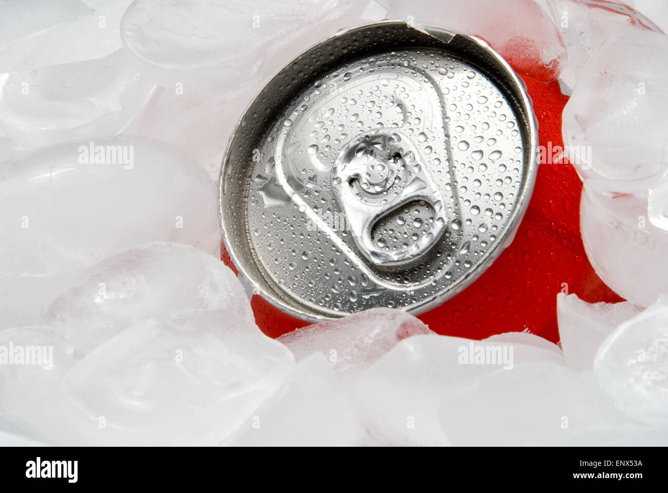 Drink Can in Ice Stock Photo - Alamy