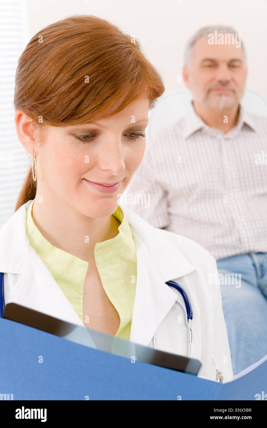 Doctor office - portrait female physician patient Stock Photo - Alamy
