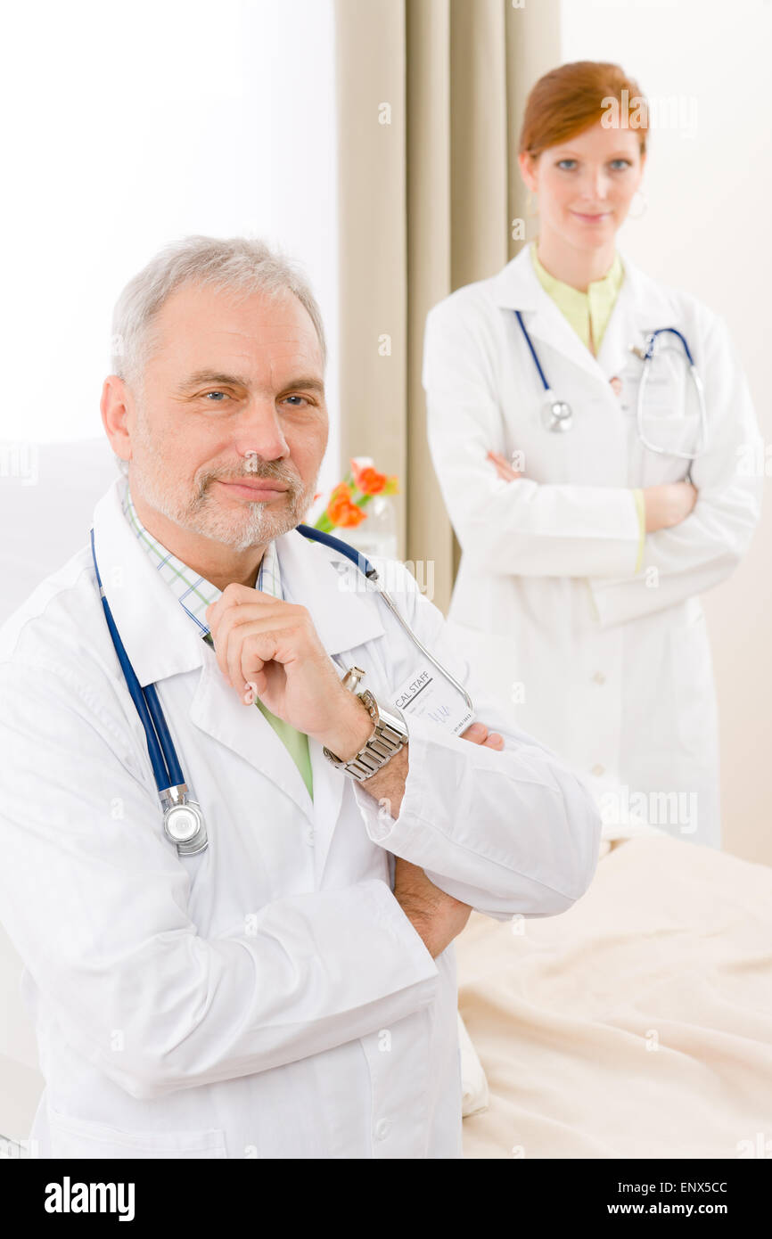 Medical team - portrait two doctor in hospital Stock Photo - Alamy