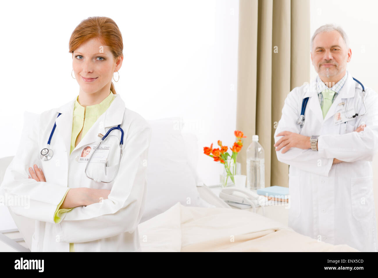 Medical team - portrait two doctor in hospital Stock Photo - Alamy