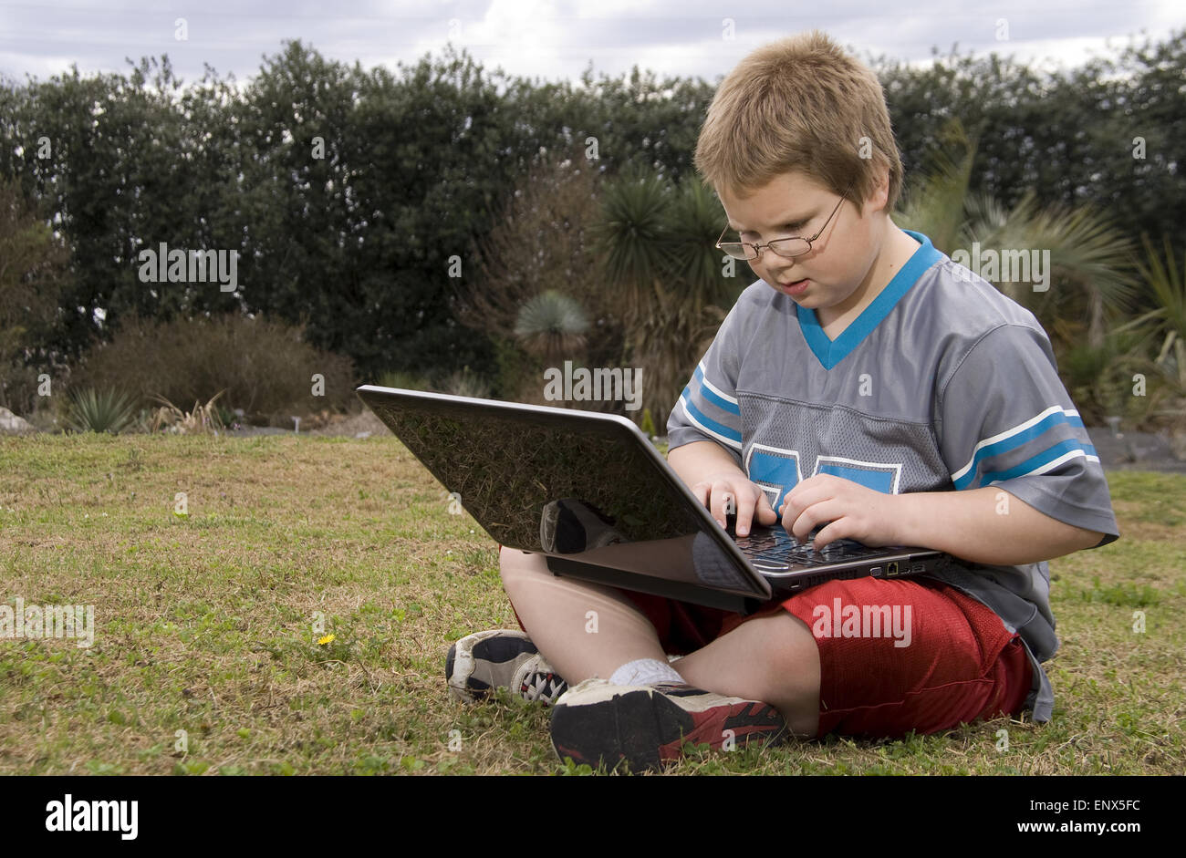 Boy Using a Computer Stock Photo - Alamy