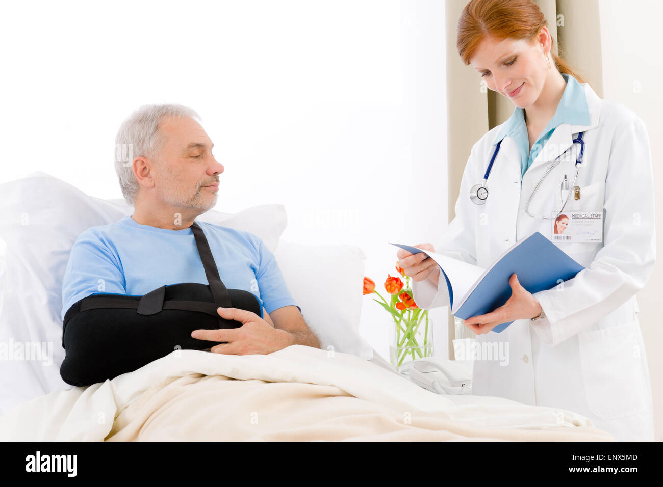 Hospital - female doctor examine senior patient Stock Photo - Alamy