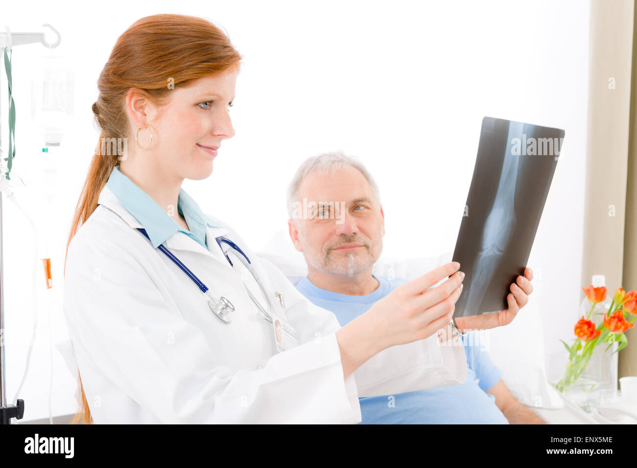 Hospital - female doctor examine patient x-ray Stock Photo - Alamy
