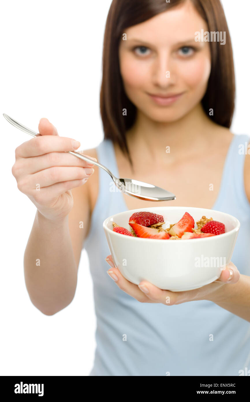 Healthy lifestyle - woman eat strawberry cereal Stock Photo - Alamy