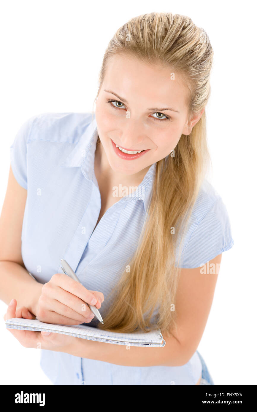 Happy student woman write notes on white background Stock Photo - Alamy