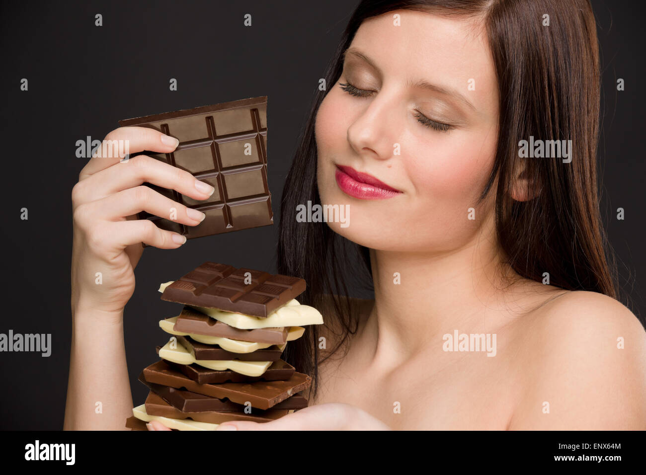 Chocolate - portrait healthy woman enjoy sweets Stock Photo - Alamy