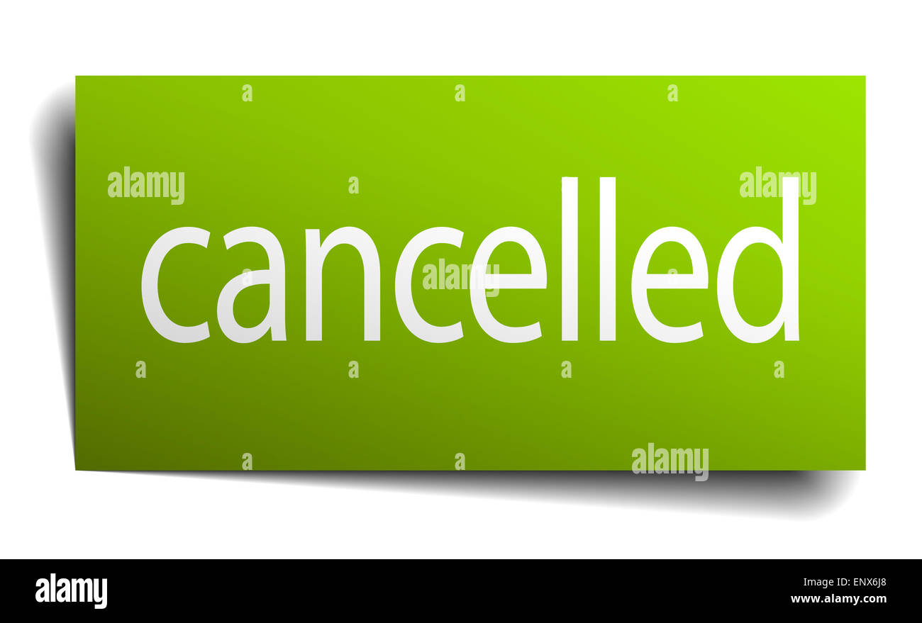 cancelled green paper sign on white background Stock Photo - Alamy