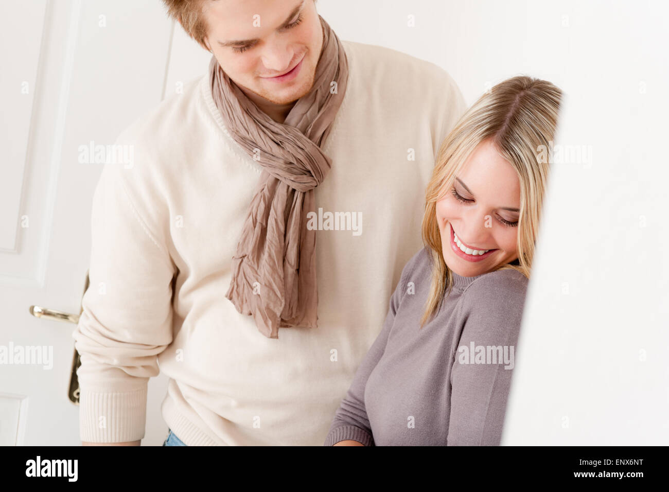 Couple in love - happy relax at home together Stock Photo - Alamy