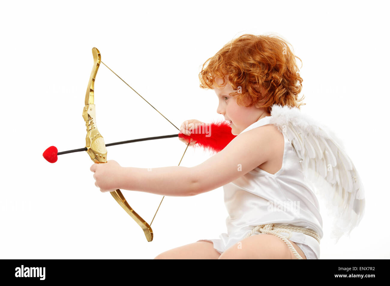 Profile of the aiming small cupid isolated on a white background Stock ...