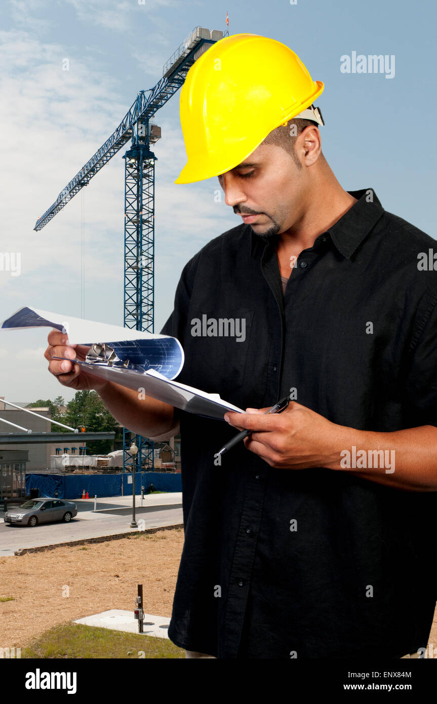 Construction Worker with Clipboard Stock Photo - Alamy