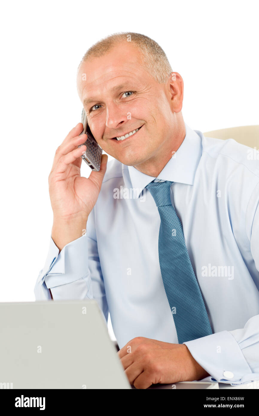 Boss sitting behind desk talking hi-res stock photography and images ...