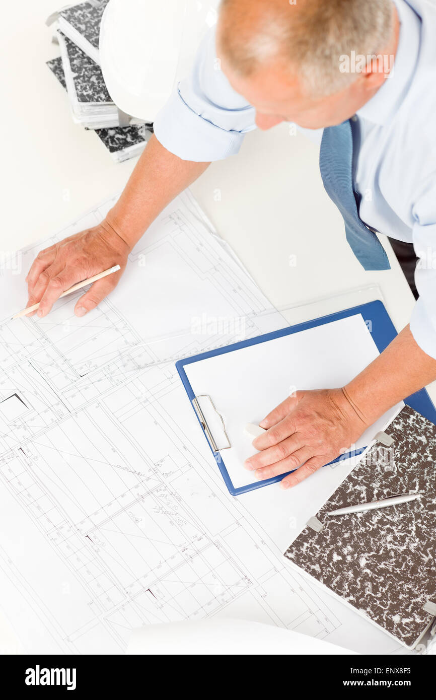 Senior man work on blueprints construction plans Stock Photo - Alamy Senior man work on blueprints construction plans Stock Photo - Alamy