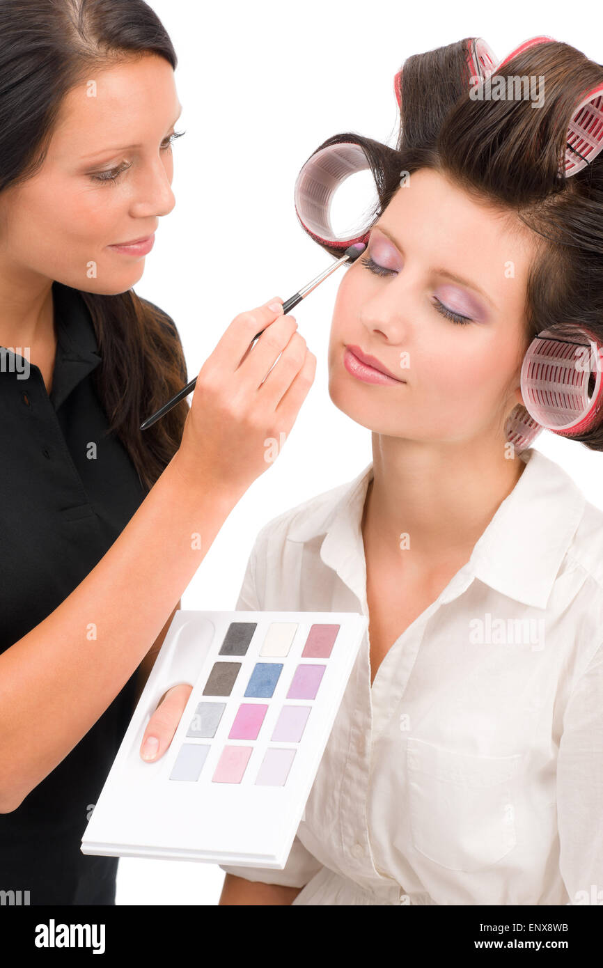 Make-up artist woman fashion model apply eyeshadow Stock Photo - Alamy
