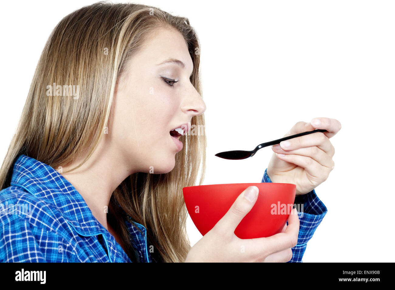 Woman eating all bran breakfast cereal hi-res stock photography and ...