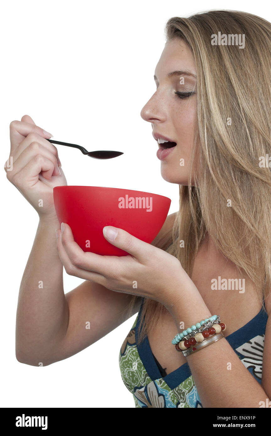 Woman eating all bran breakfast cereal hi-res stock photography and ...