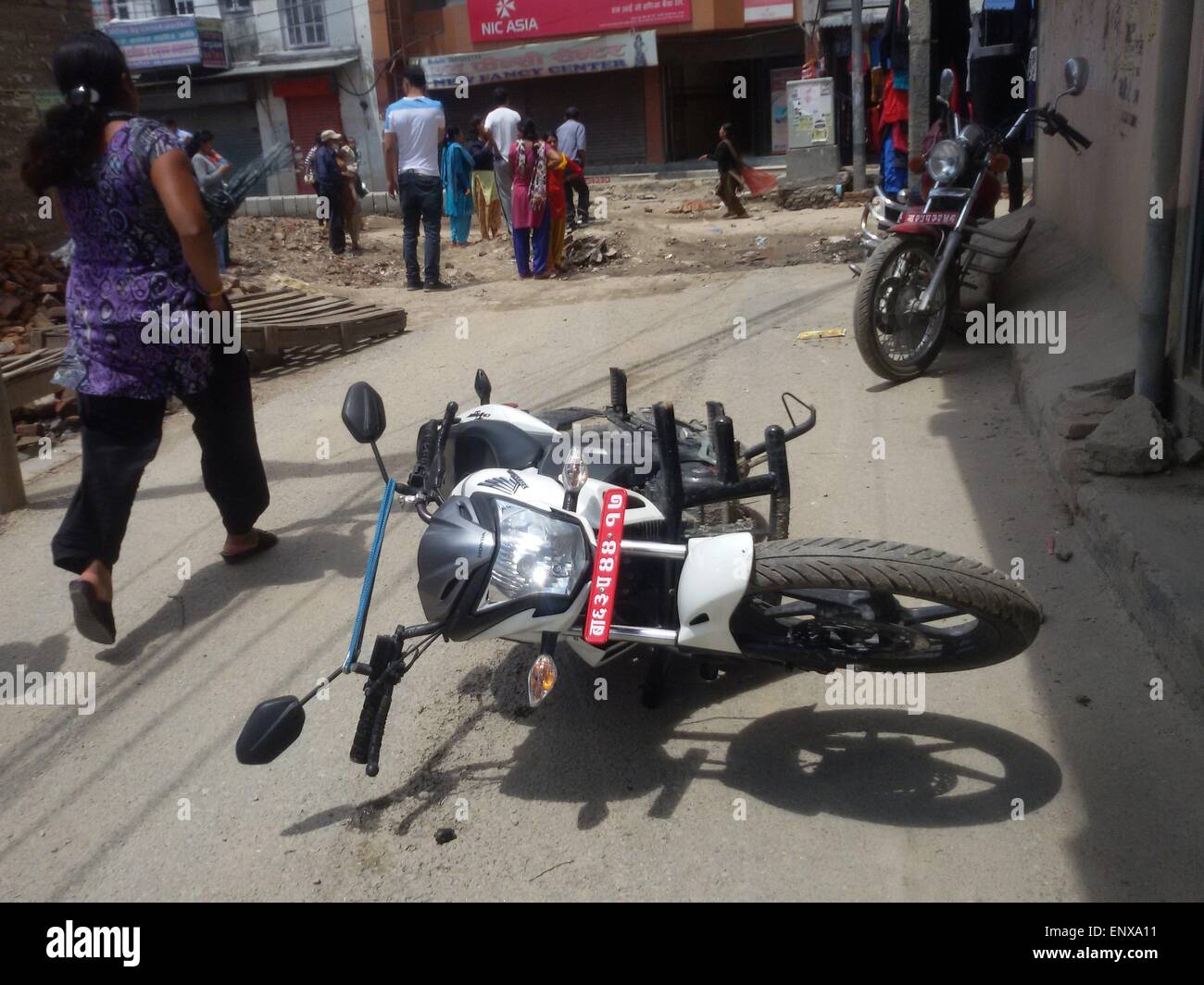 Kathmandu, Nepal. 12th May, 2015. A motorcycle is seen lying on the ...