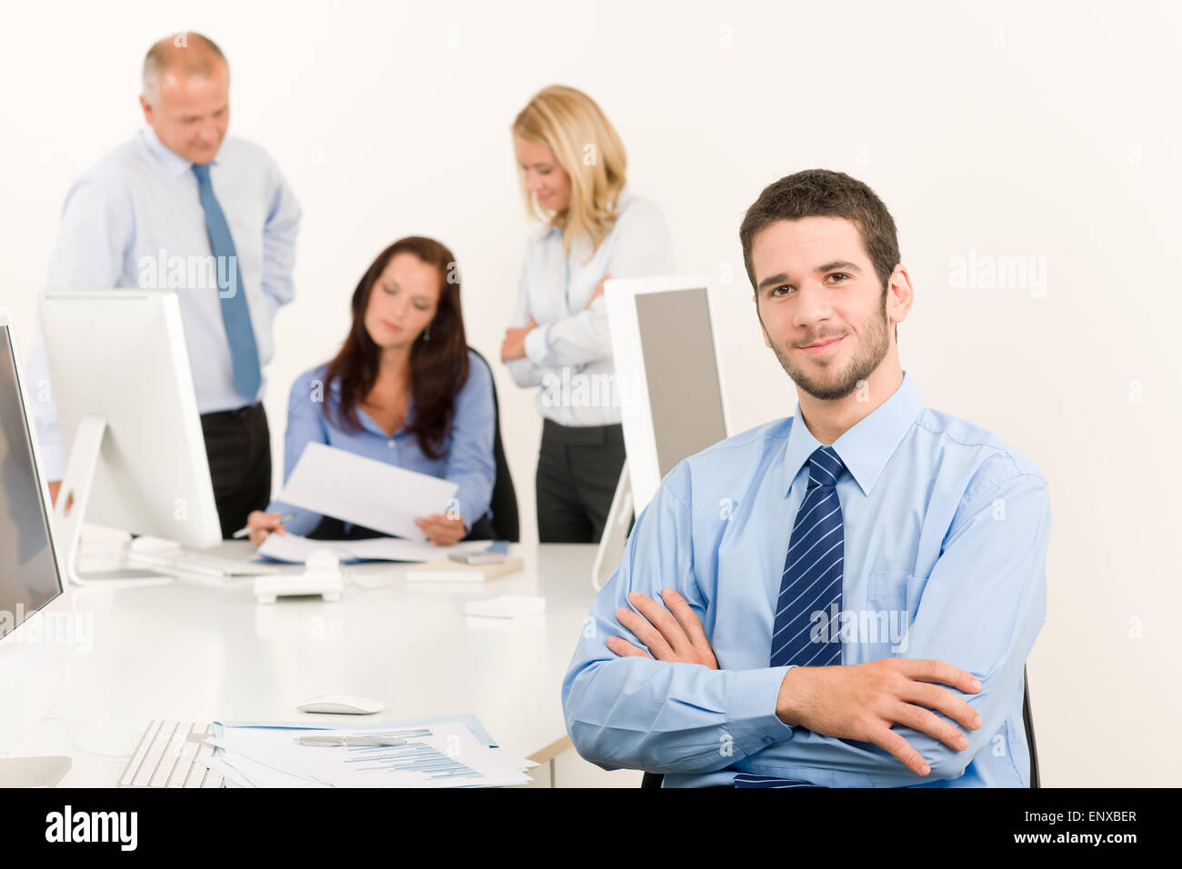 Business team young manager with work colleagues Stock Photo - Alamy