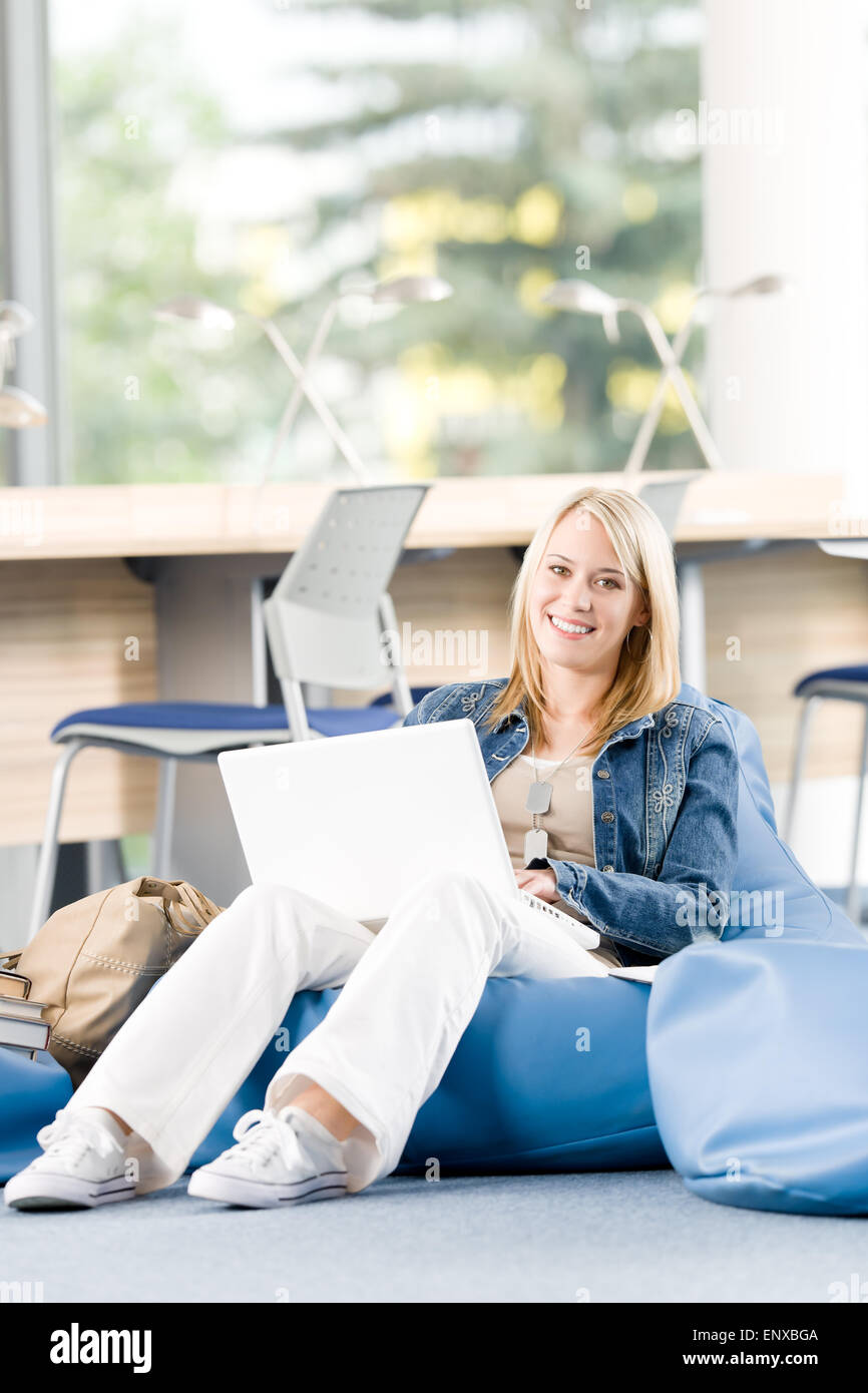 Young happy high-school student relax with laptop Stock Photo - Alamy