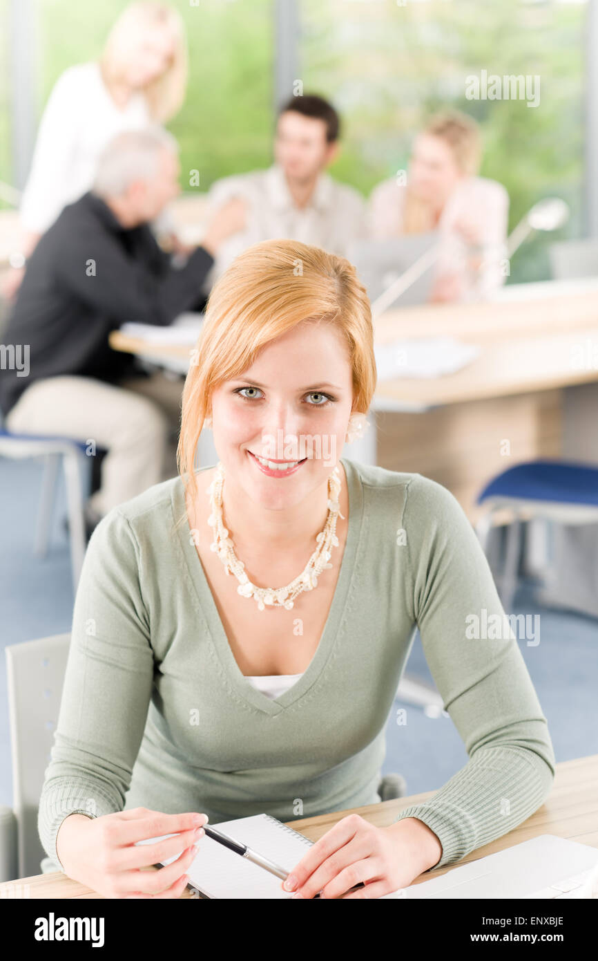 Young business students - businesswoman in front Stock Photo - Alamy