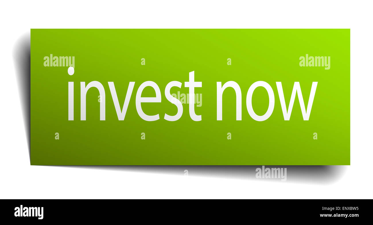 invest now green paper sign isolated on white Stock Photo - Alamy