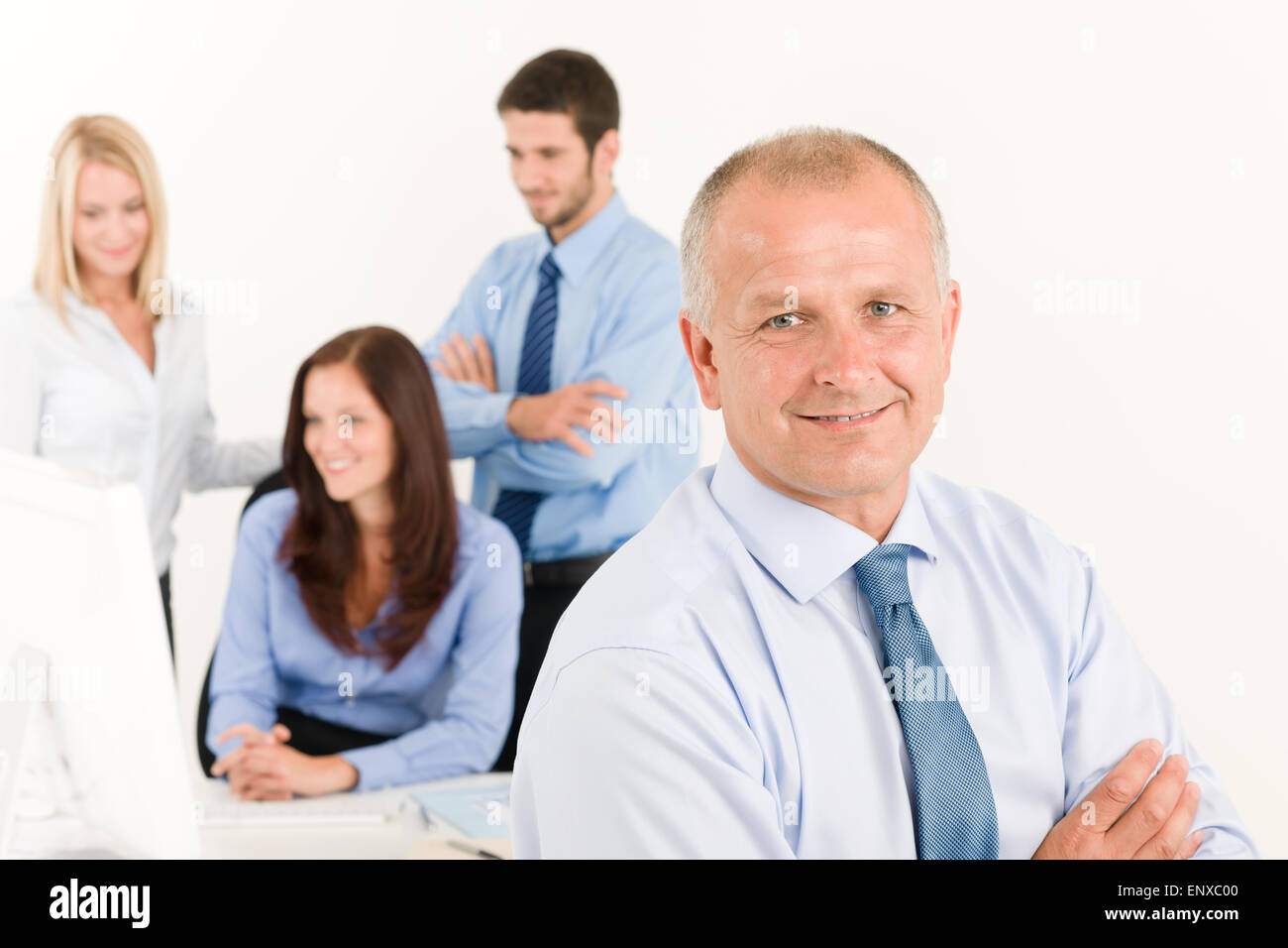 Business team senior manager with happy colleagues Stock Photo - Alamy