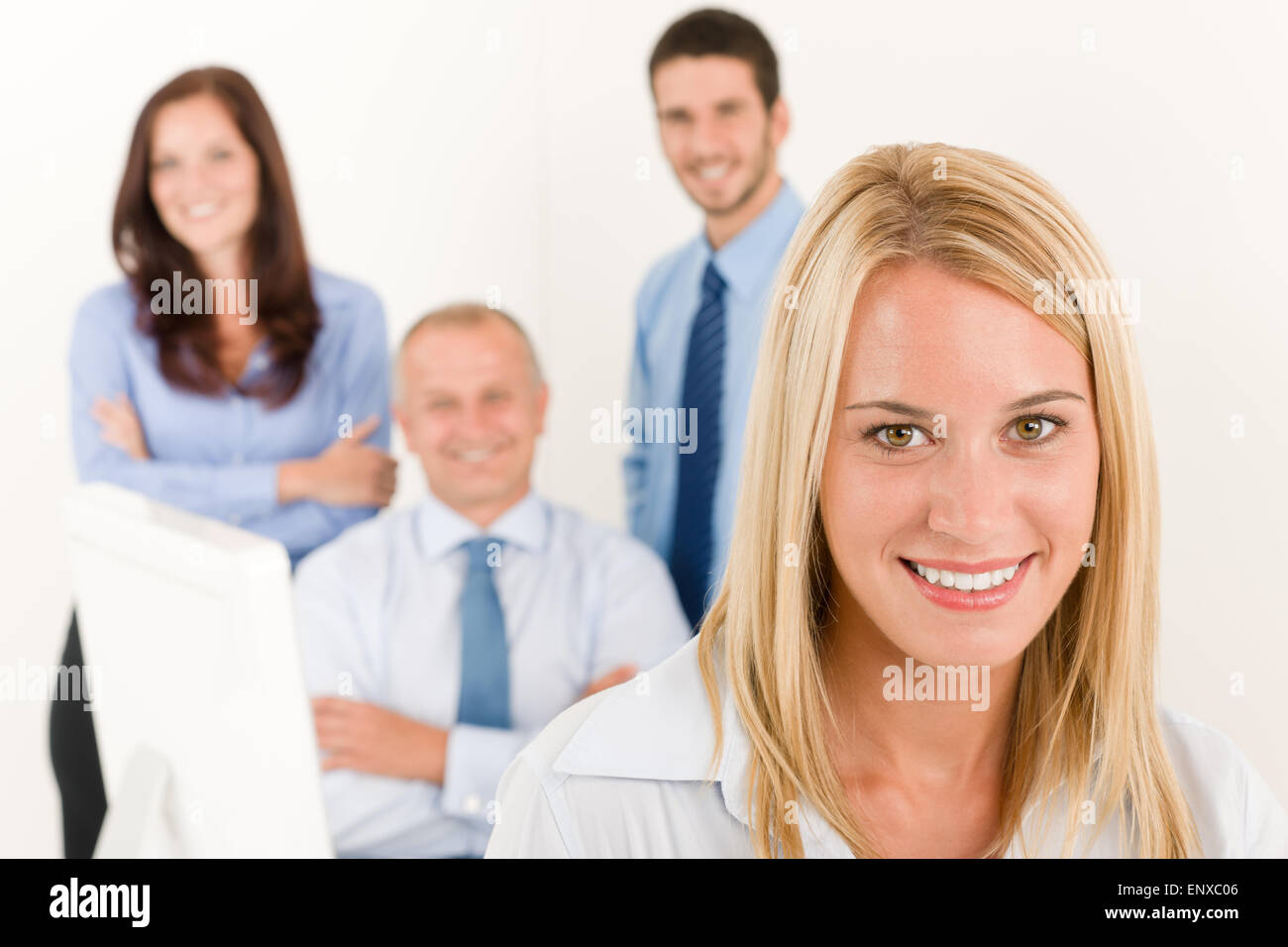 Business team pretty businesswoman with colleagues Stock Photo - Alamy