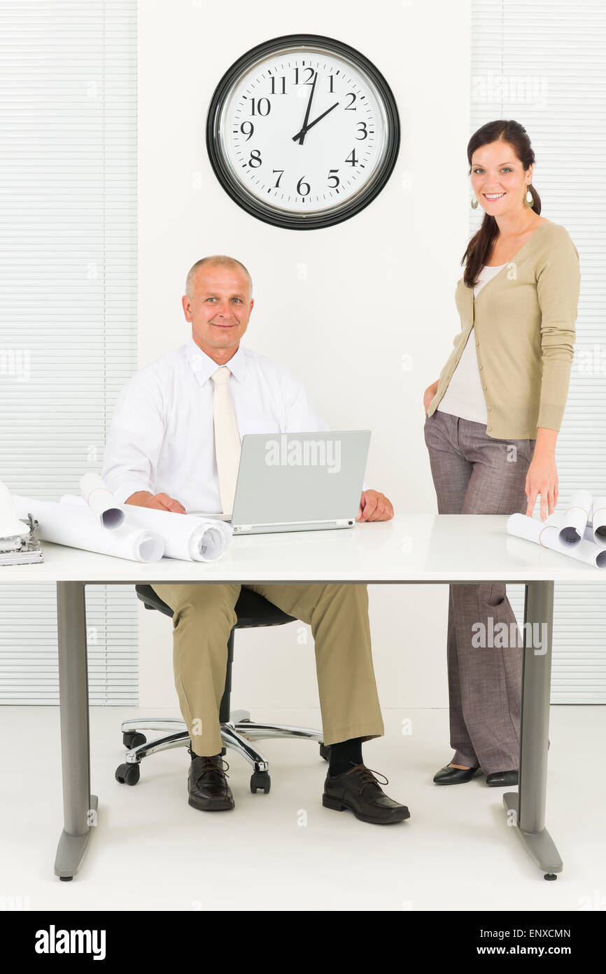 Professional architect people behind office table Stock Photo - Alamy