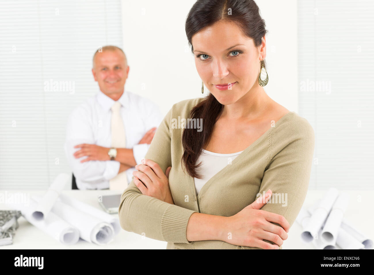 Professional architect woman with blueprint office Stock Photo - Alamy